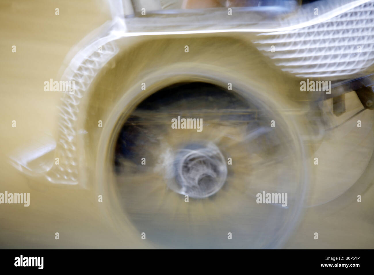 Chariot wheel moving at speed turning high velocity motion blur fast ...