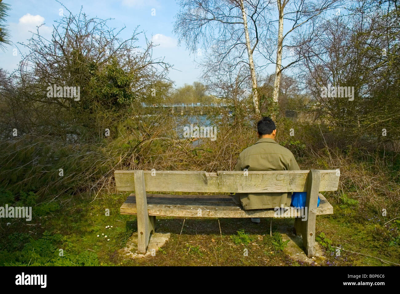 man sitting on the Bench Stock Photo - Alamy