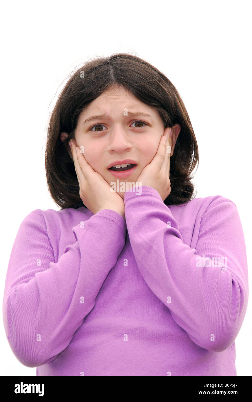 Portrait of a young girl expressing fear and disgust Stock Photo - Alamy