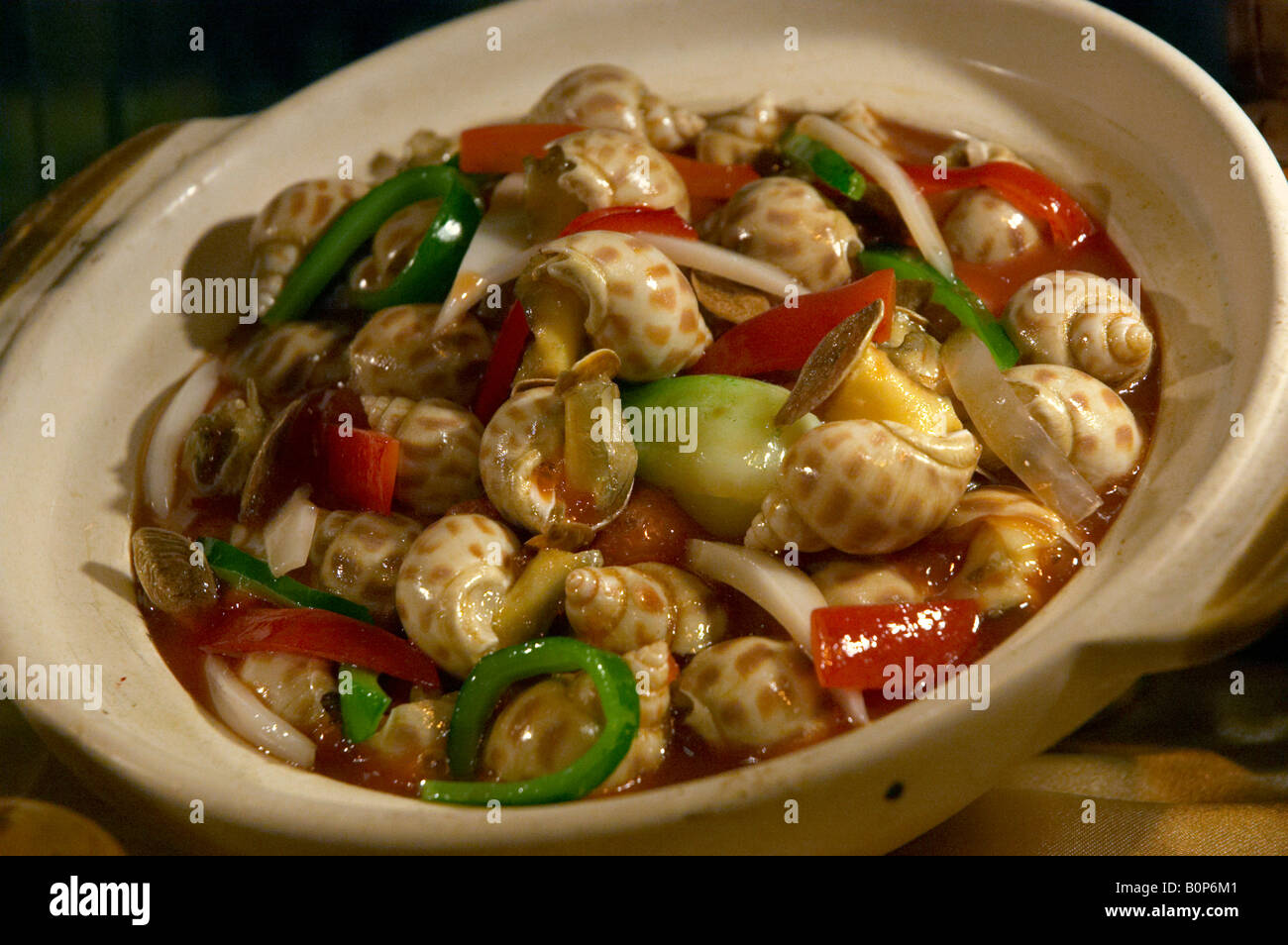 Dish of Snails, Macau, China Stock Photo - Alamy