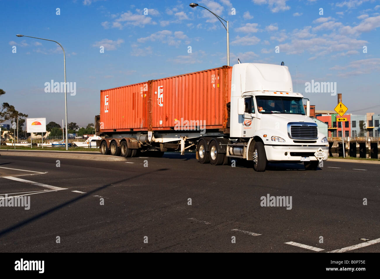 Transportation and Trucking / A Semi - Trailer transporting a Shipping ...