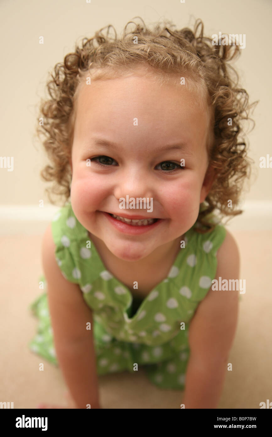 Cute three year old child smiling for the camera Stock Photo - Alamy