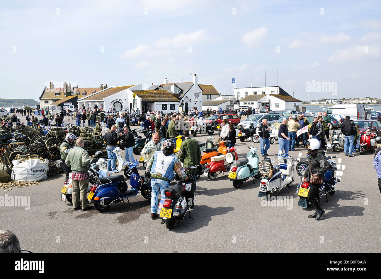 general view of people attending a scoot meet at Mudeford Quay Stock ...