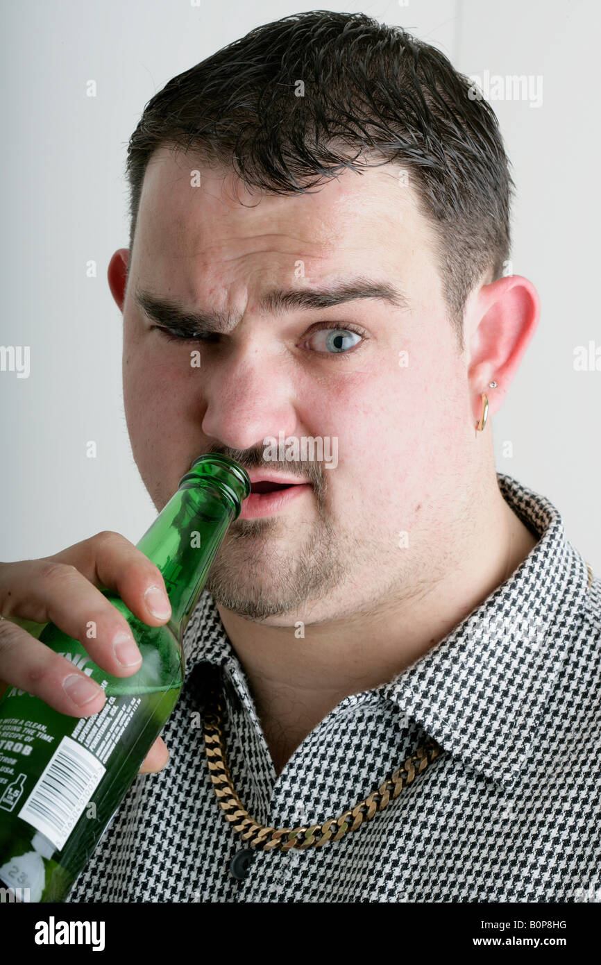 Man with beer bottle Stock Photo - Alamy