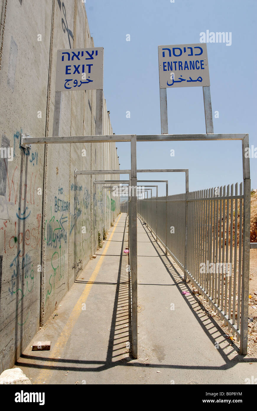 A checkpoint in the Wall in Bethlehem, Palestine. Thousands of people ...