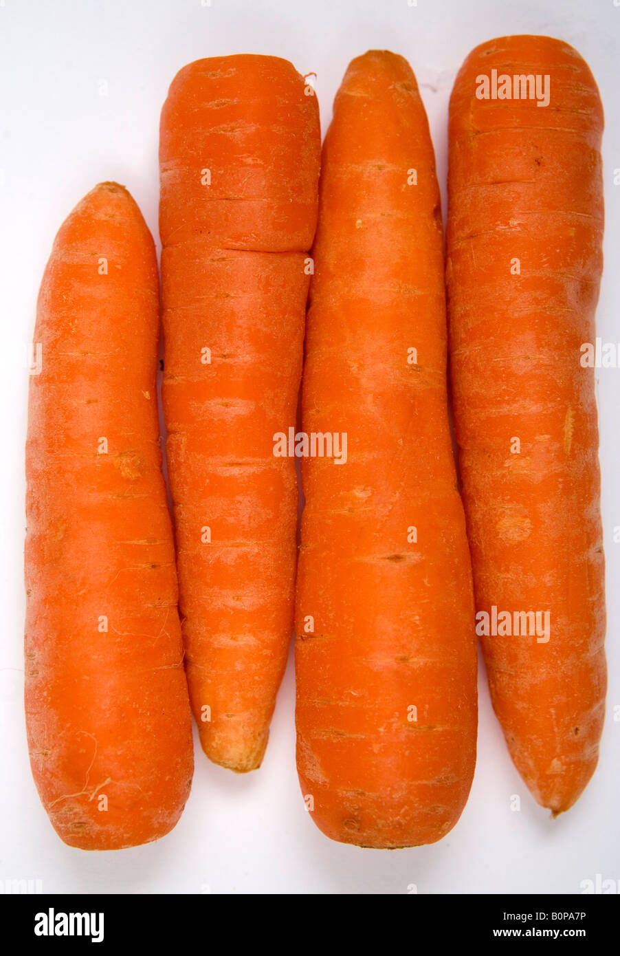 Four carrots hi-res stock photography and images - Alamy