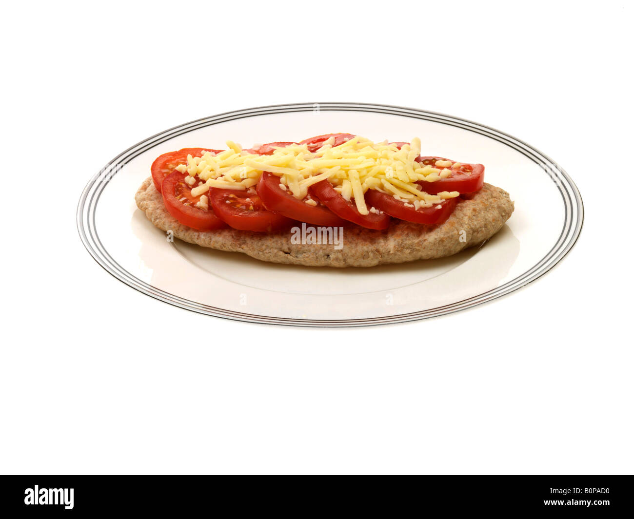 Wholemeal Pitta Bread Topped With Tomato and Cheese Stock Photo - Alamy