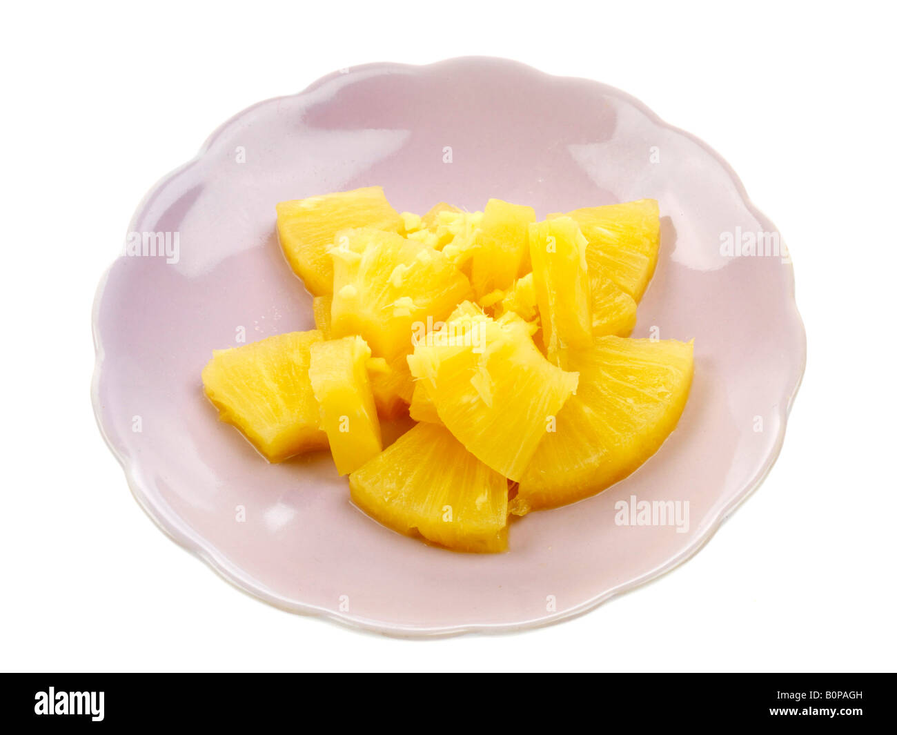 Pineapple Chunks With Ginger Stock Photo - Alamy