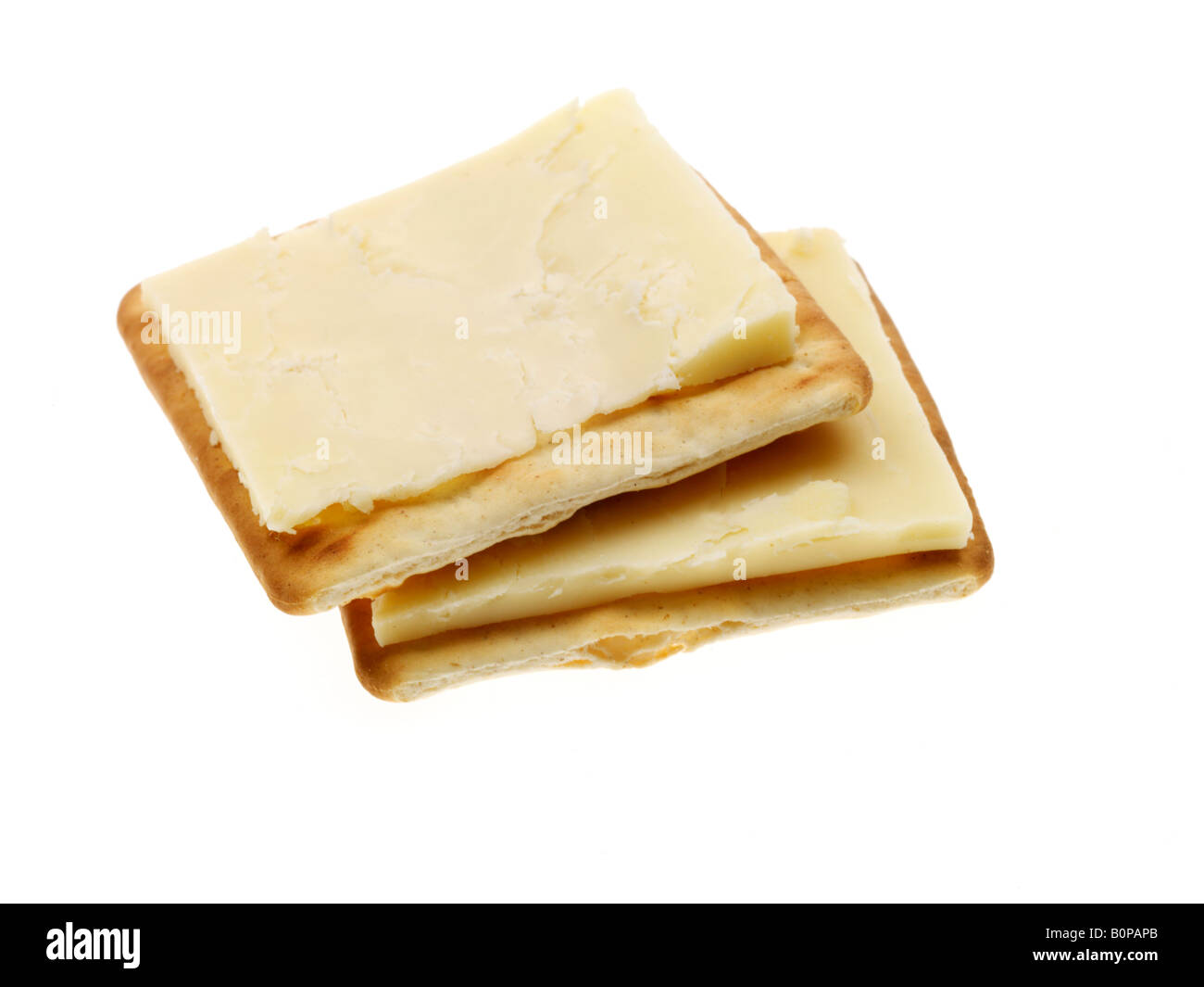 Freshly Sliced Cheddar Cheese On Crackers Savoury Dessert Isolated ...