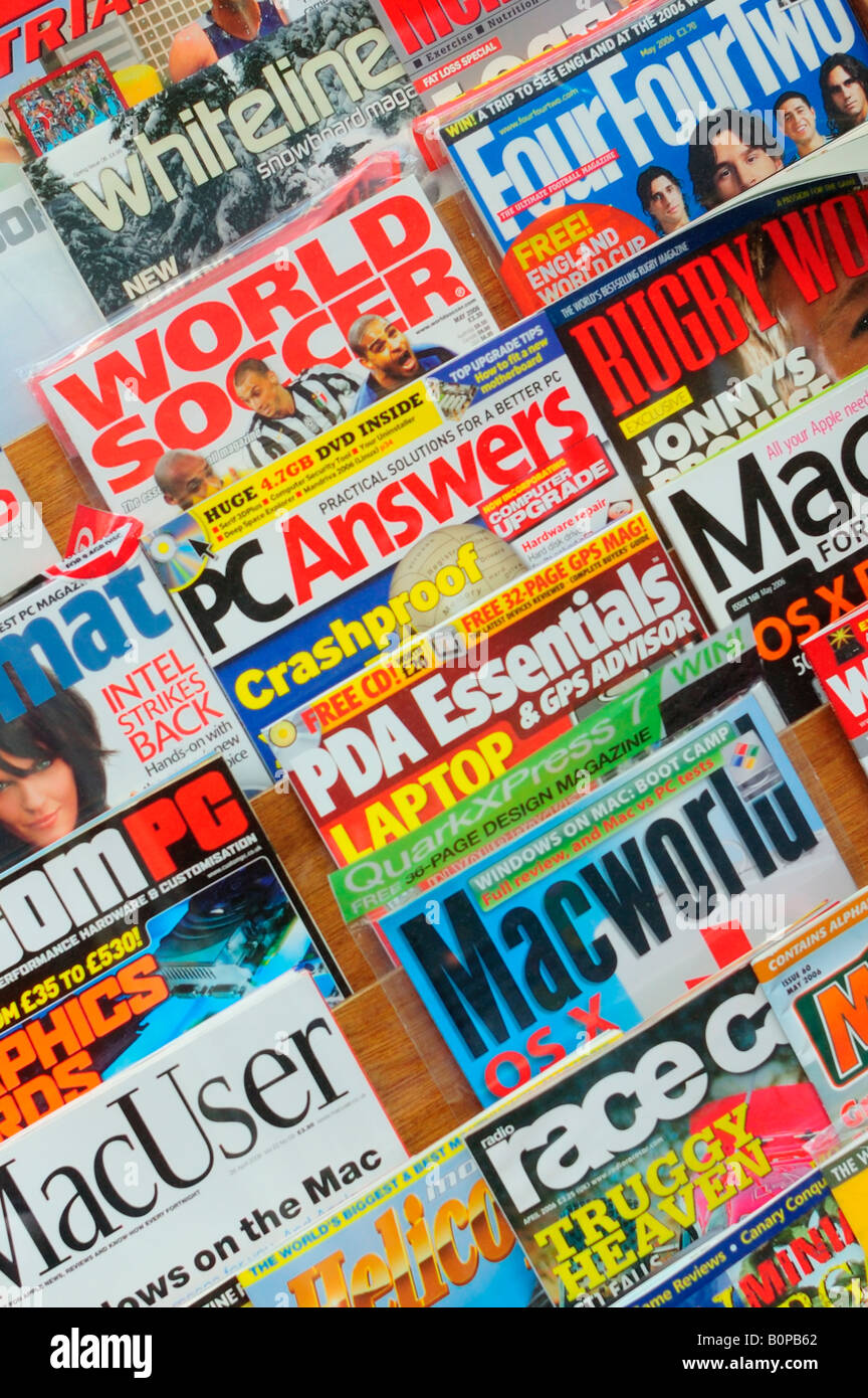 Magazines on Display in Newsagents Window Stock Photo - Alamy