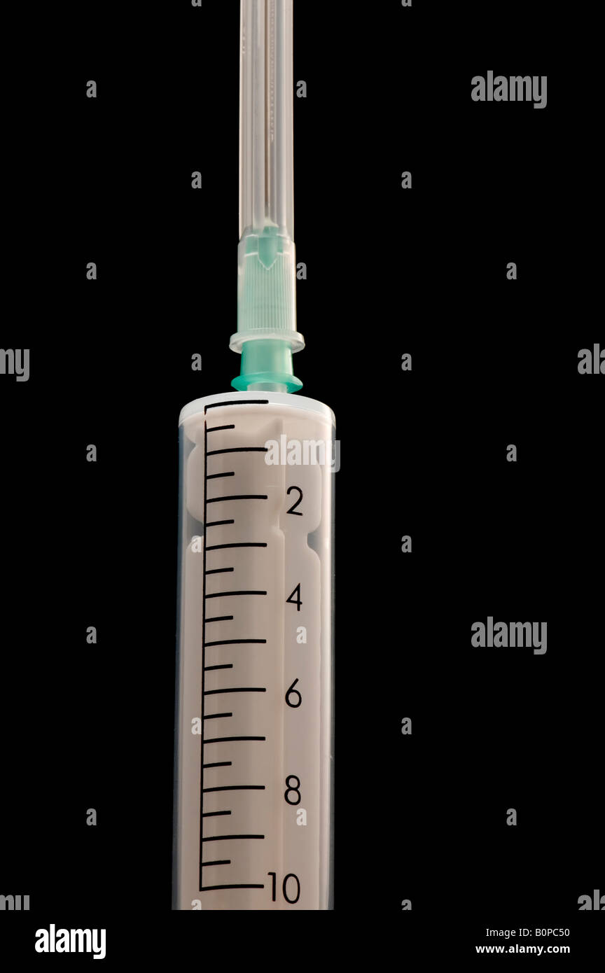 object on black medical tool Syringe Stock Photo - Alamy