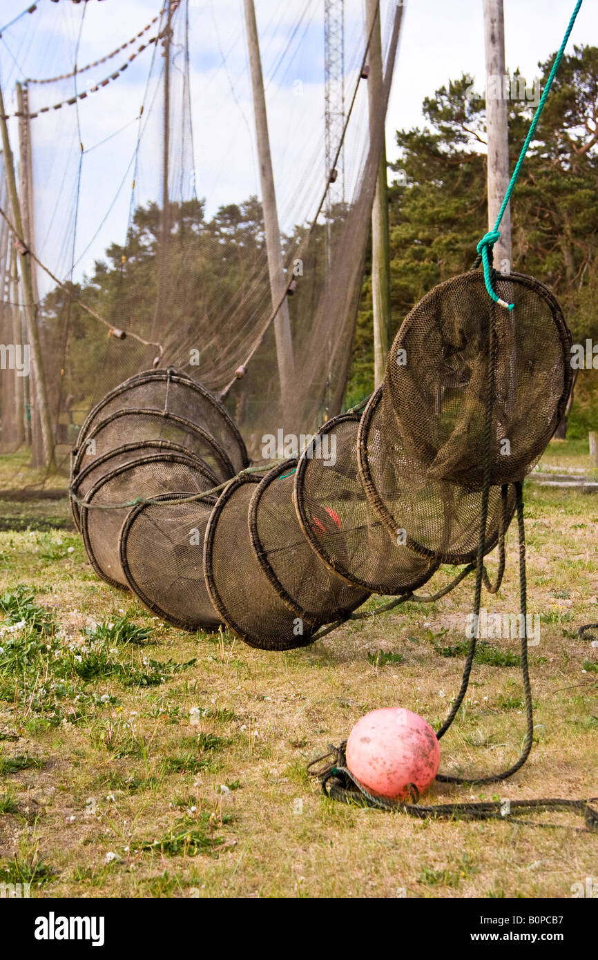 eel net hanging in air to dry Stock Photo - Alamy