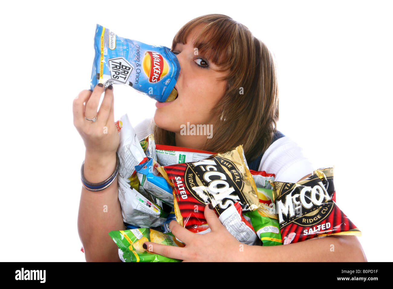 Teenage Girl Eating Crisps Model Released Stock Photo - Alamy