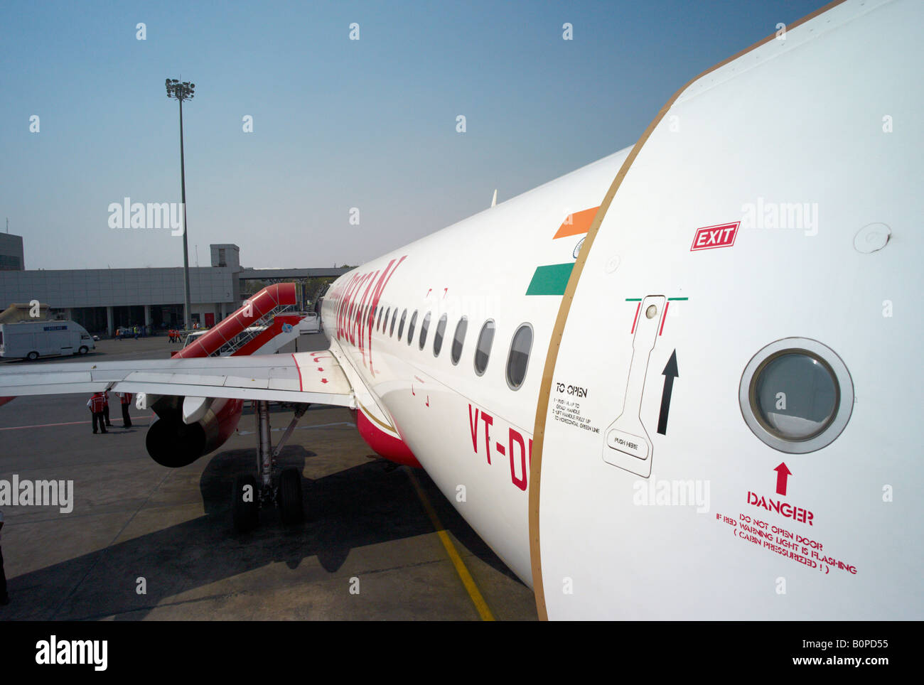 Airplane boarding rear door Stock Photo - Alamy