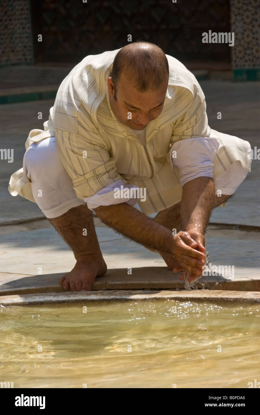 Muslim washing hi-res stock photography and images - Alamy