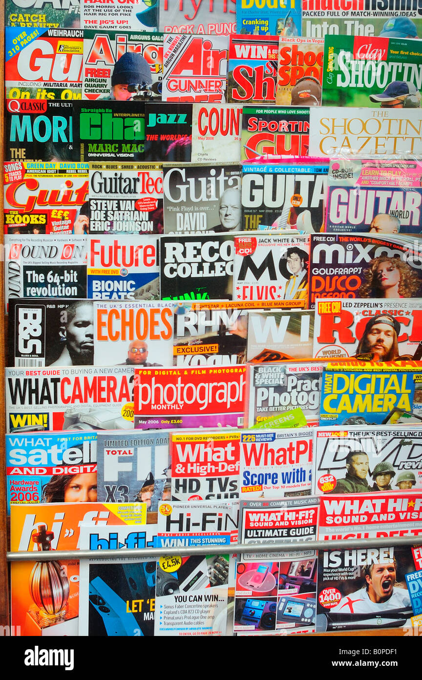 Magazines on Display in Newsagents Window Stock Photo - Alamy