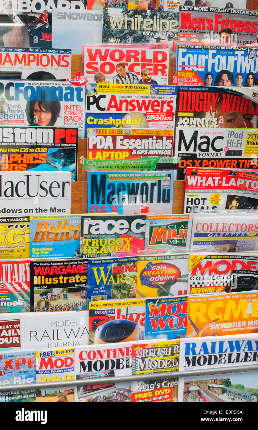 Magazines on Display in Newsagents Window Stock Photo - Alamy