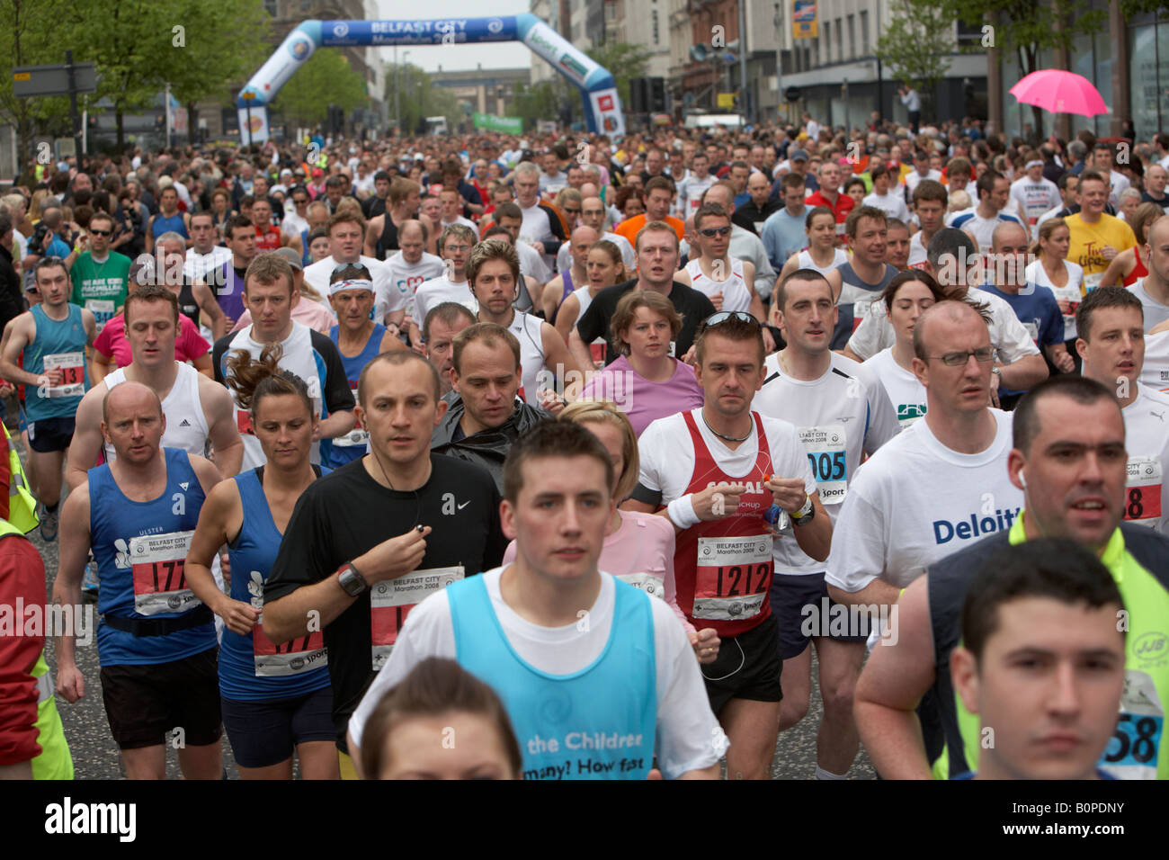competitors run past the start of the belfast marathon 2008 belfast ...