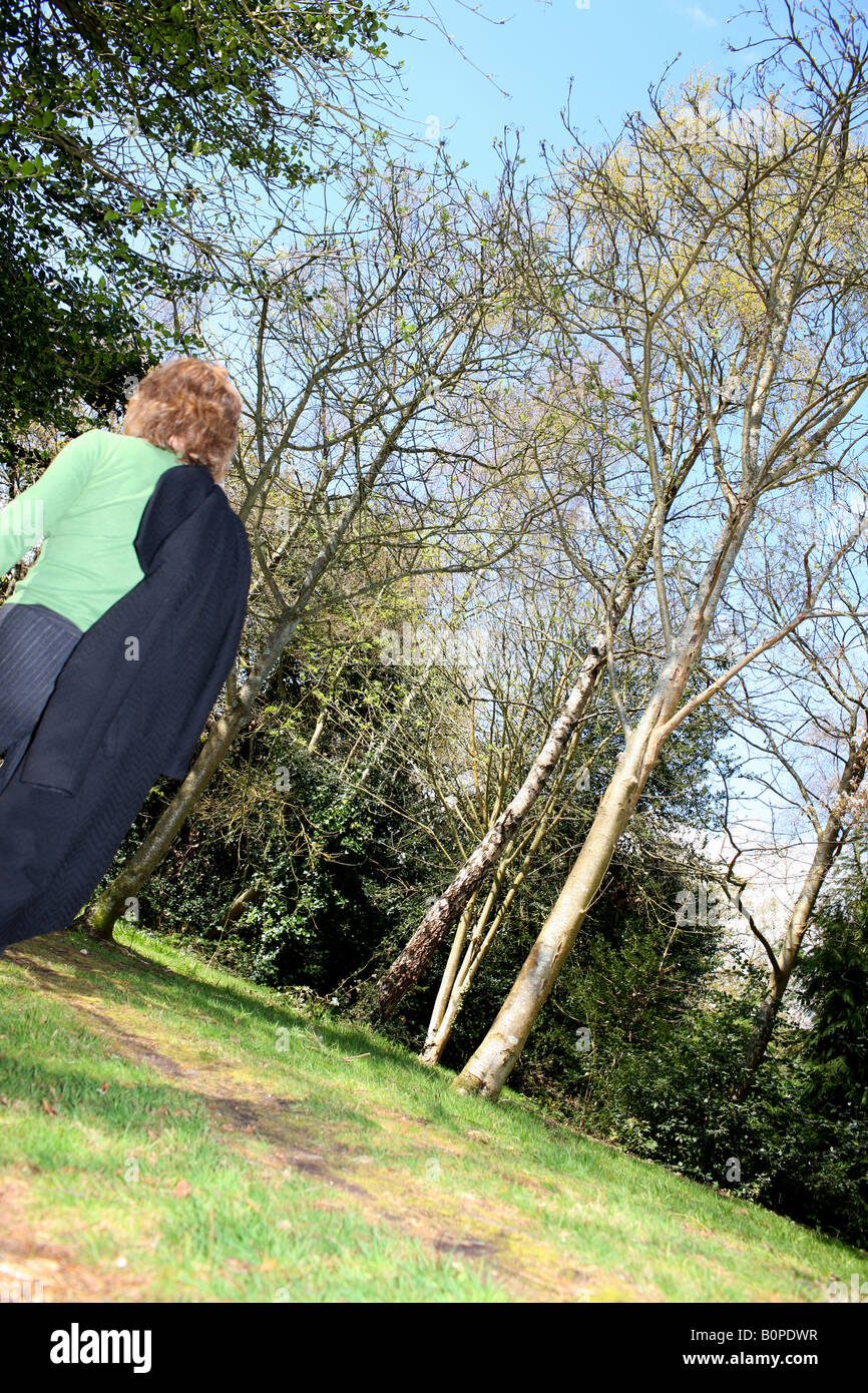 Woman walks through sunny field hi-res stock photography and images - Alamy