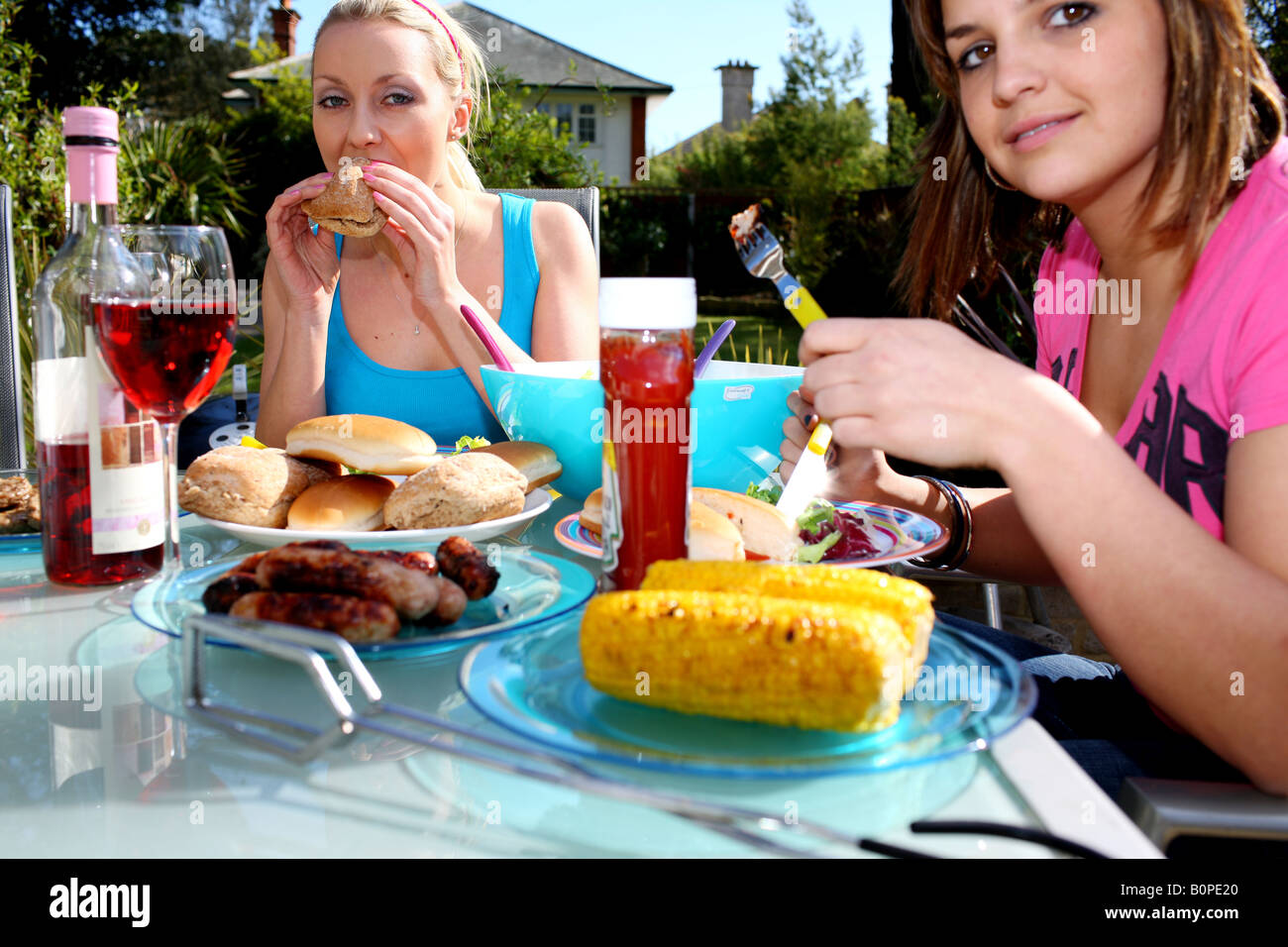 Model released woman eating sausage hi-res stock photography and images ...