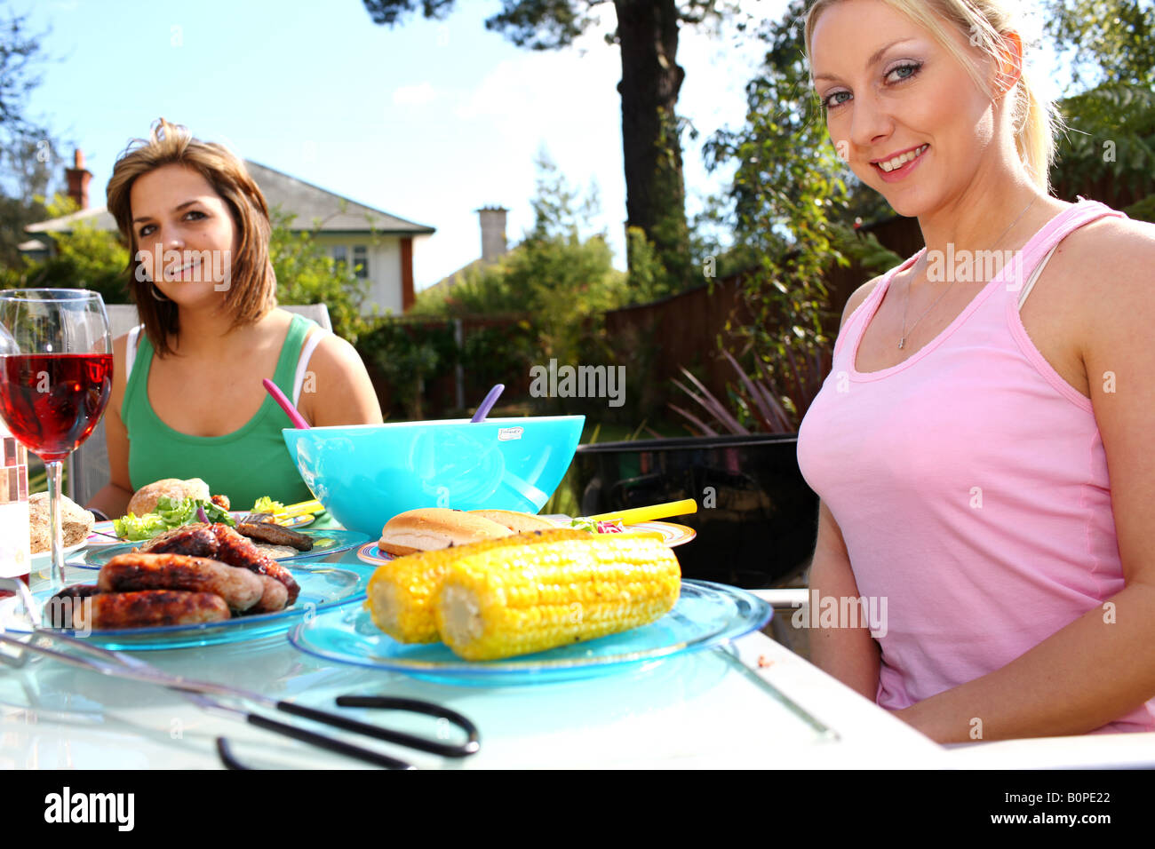 Young Women at a Barbecue Model Released Stock Photo - Alamy