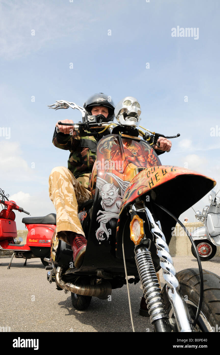 front view of rider on customised scooter Stock Photo - Alamy