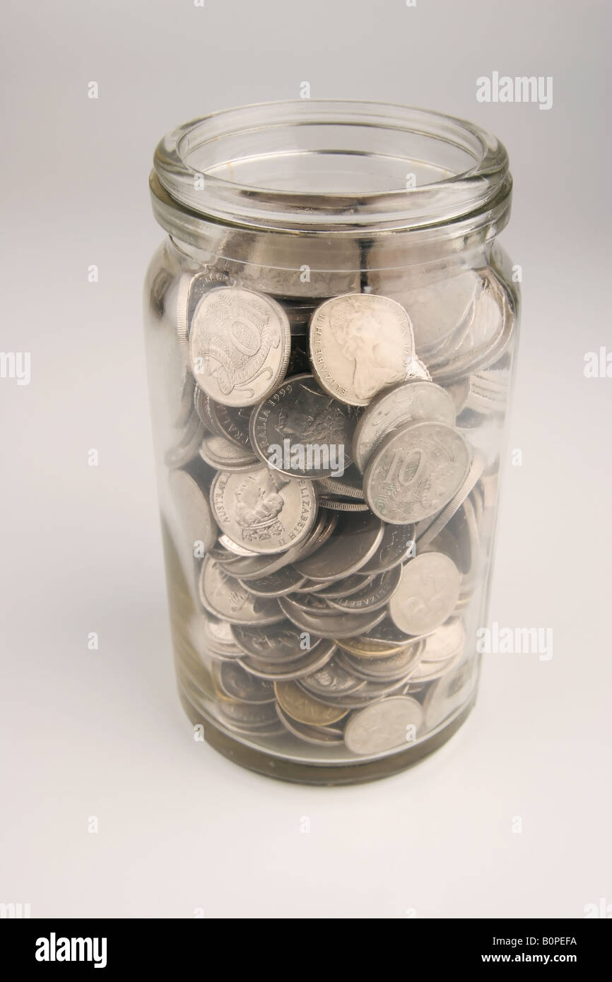 Australian coins in a jar Stock Photo - Alamy