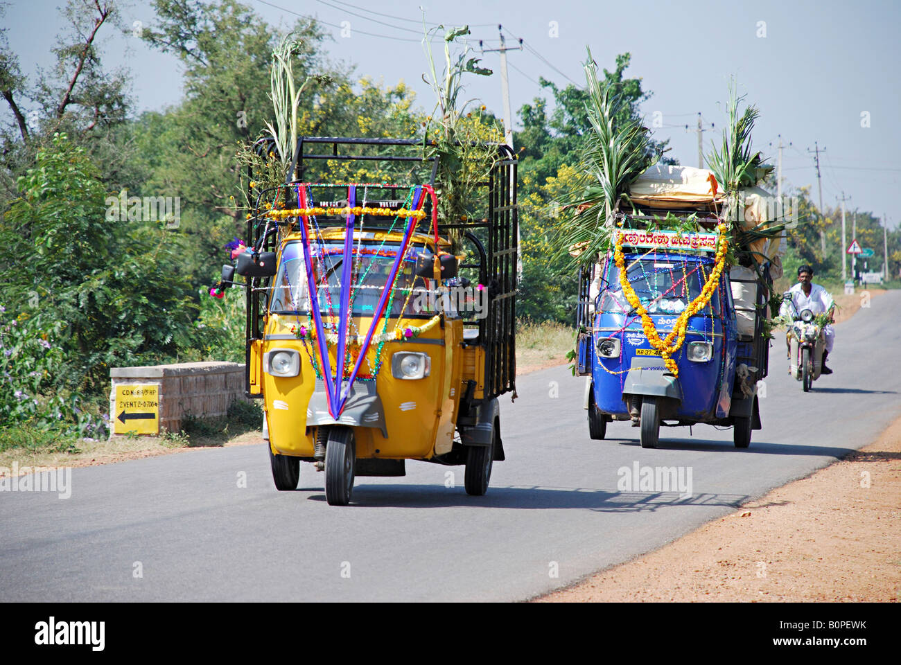 Decorated three wheeler, Rikshaw, on road during Diwali Stock Photo - Alamy