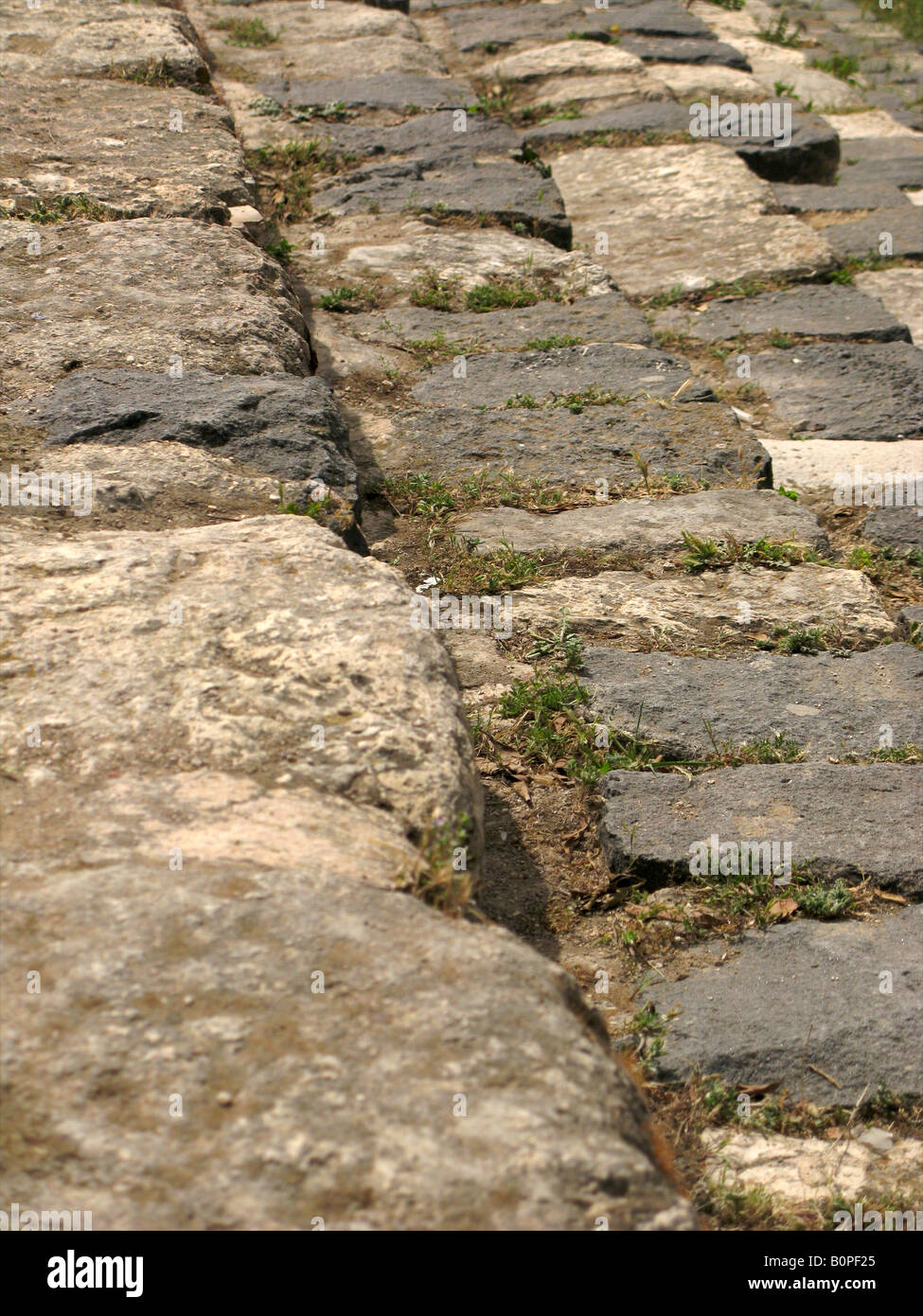 Ancient Roman steps in the antique city of Umm Qais, North Jordan ...