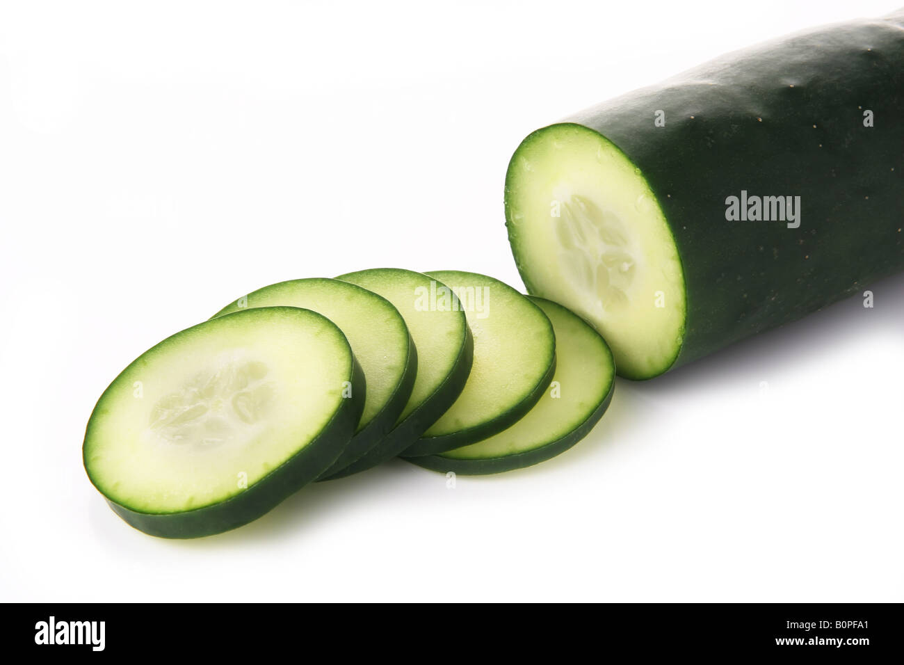 Cucumber cut in slices Stock Photo - Alamy
