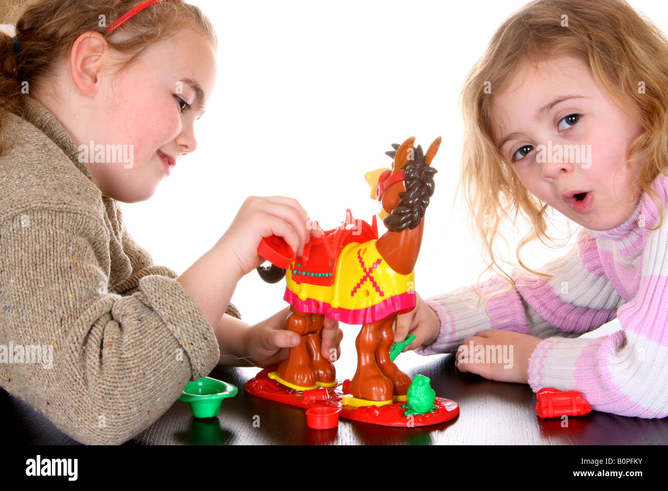 Children Playing Game Models Released Stock Photo - Alamy