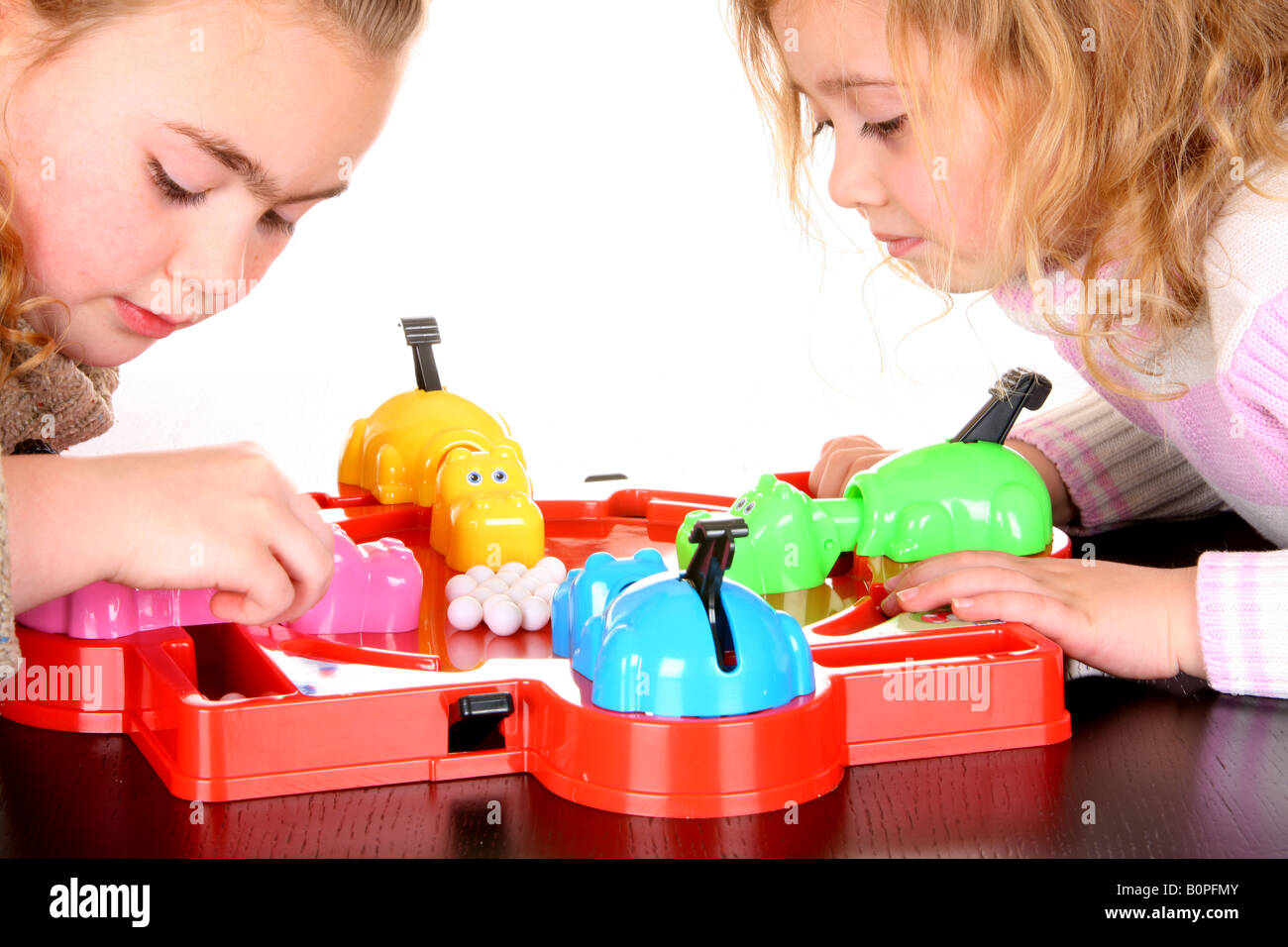 Children Playing Game Models Released Stock Photo - Alamy
