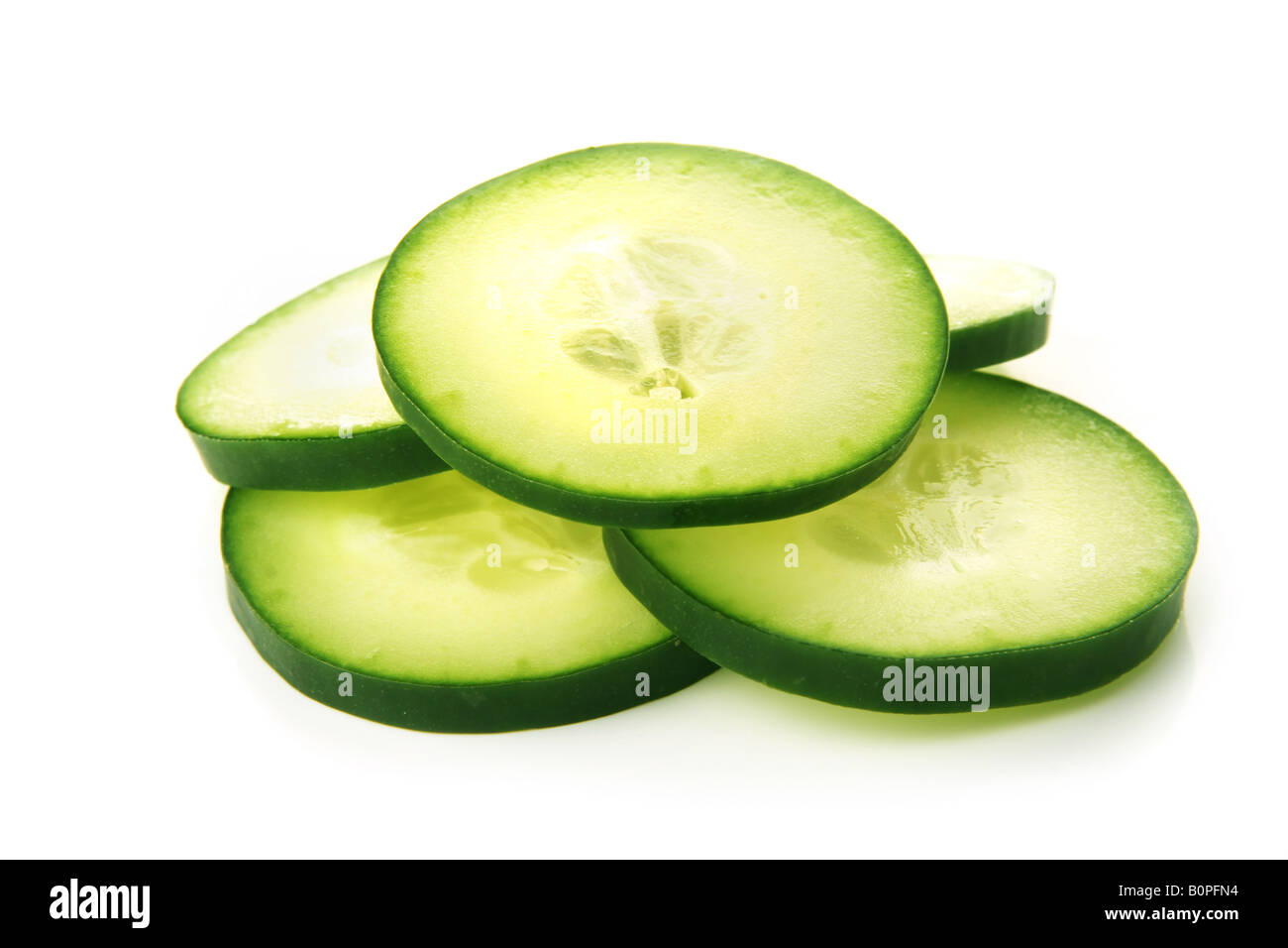 Cucumber cut in slices Stock Photo - Alamy