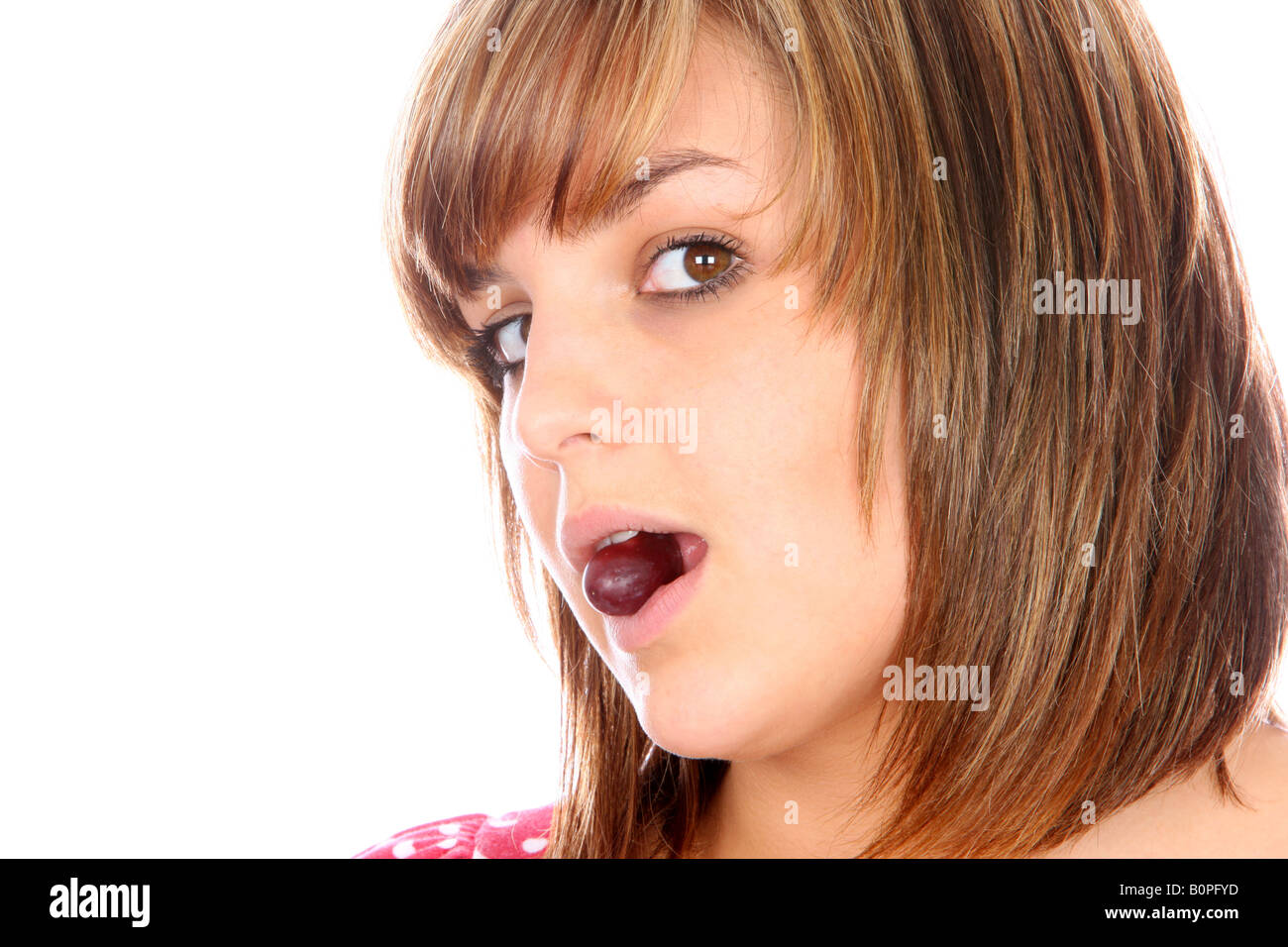 Young Woman Eating Red Grapes Model Released Stock Photo - Alamy