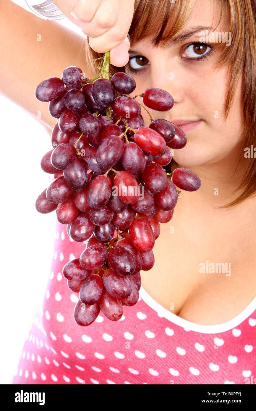 Young Woman Holding Red Grapes Model Released Stock Photo - Alamy