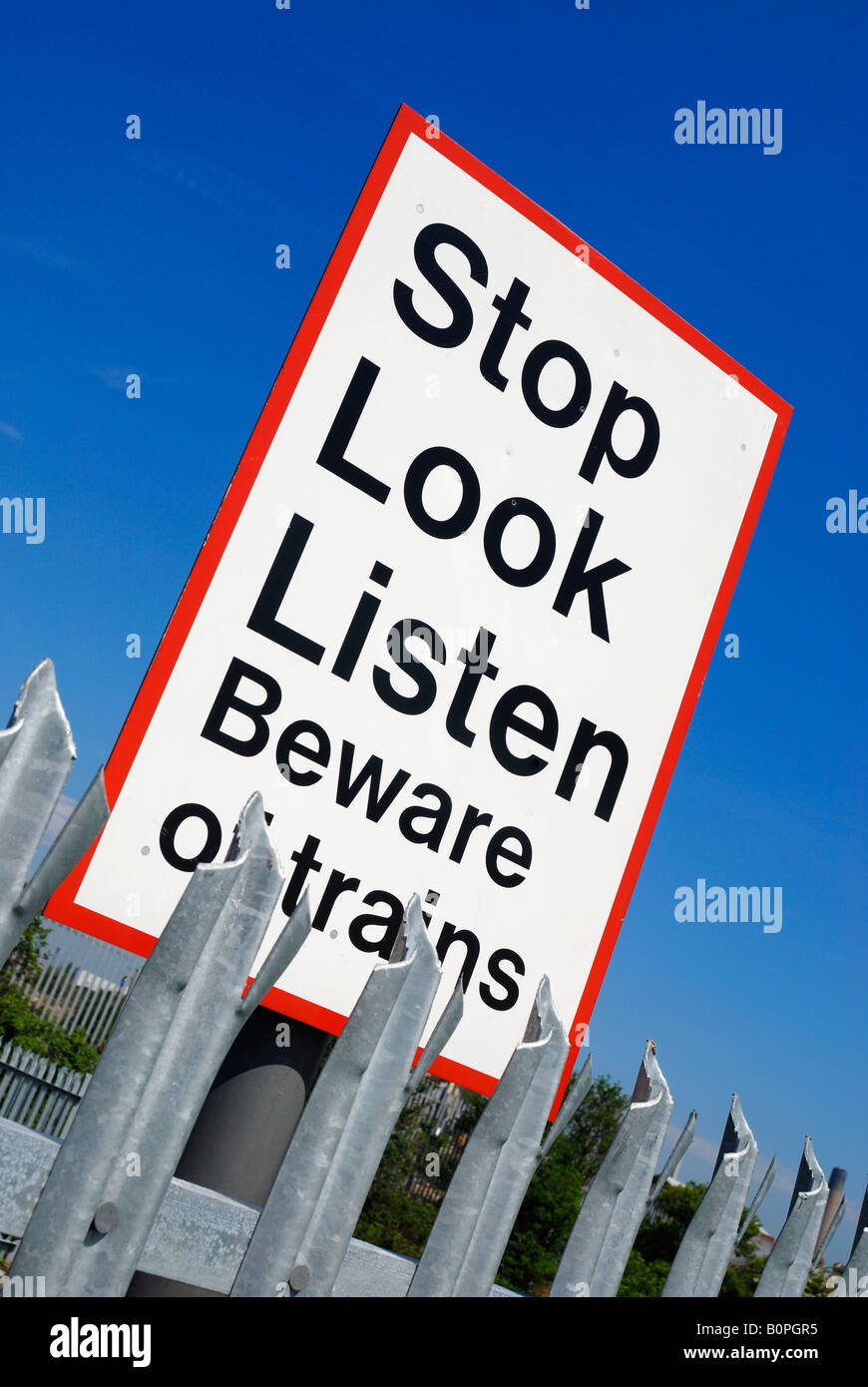 Stop look listen warning sign by railway level crossing in Widnes The ...