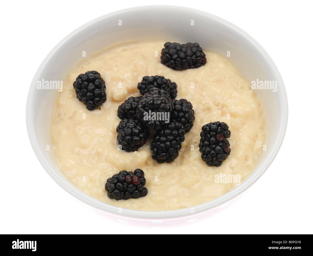 Rice Pudding with Blackberries Stock Photo - Alamy