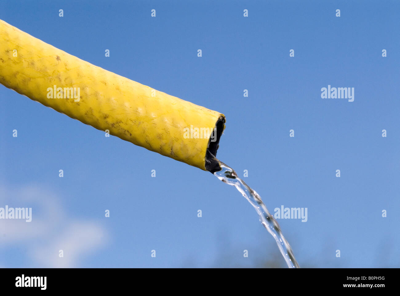 Hosepipe with Slow Water Flow Stock Photo - Alamy