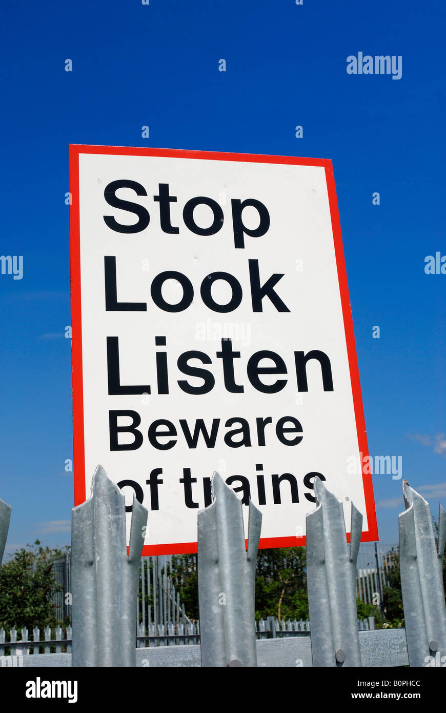 Stop look listen warning sign by railway level crossing in Widnes The ...