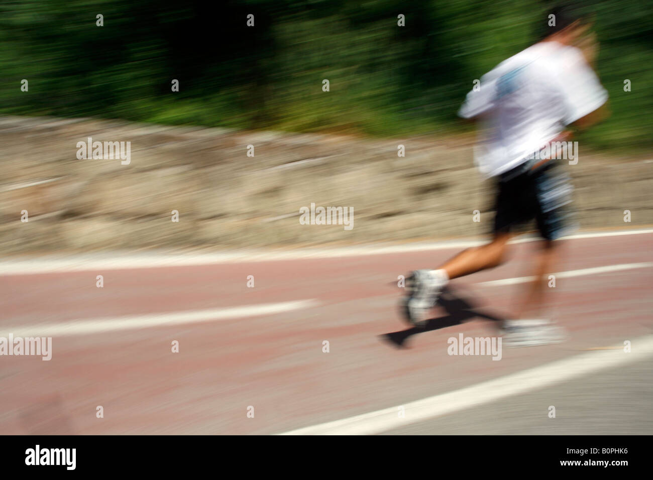 one fast runner in countryside Stock Photo - Alamy
