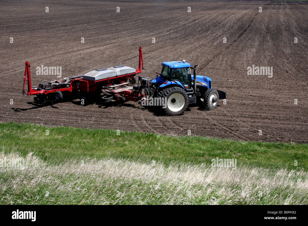 Tractor with seed planter hi-res stock photography and images - Alamy