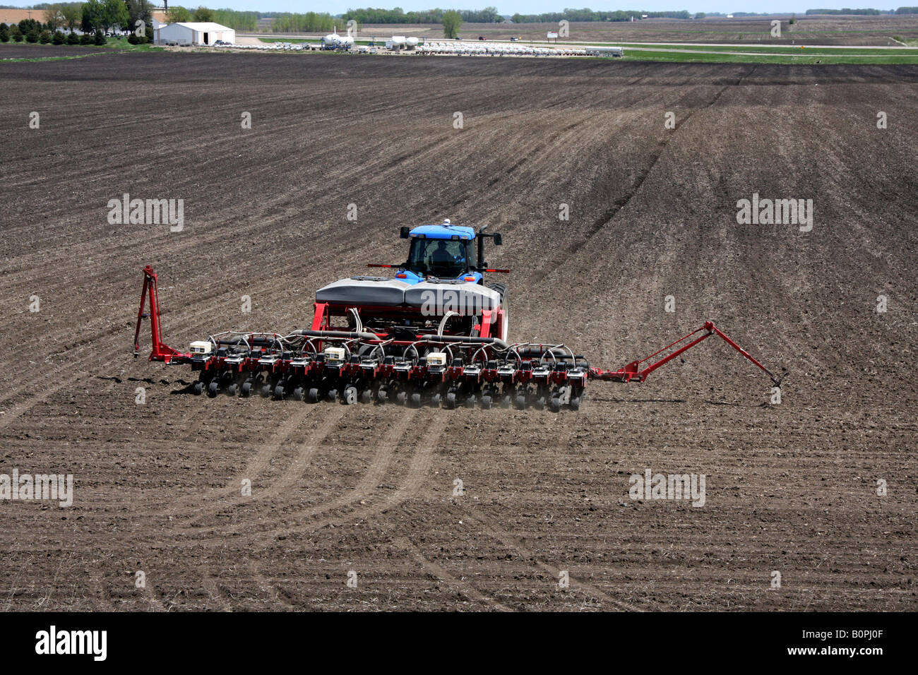 Tractor and planter lowering row marker Stock Photo - Alamy