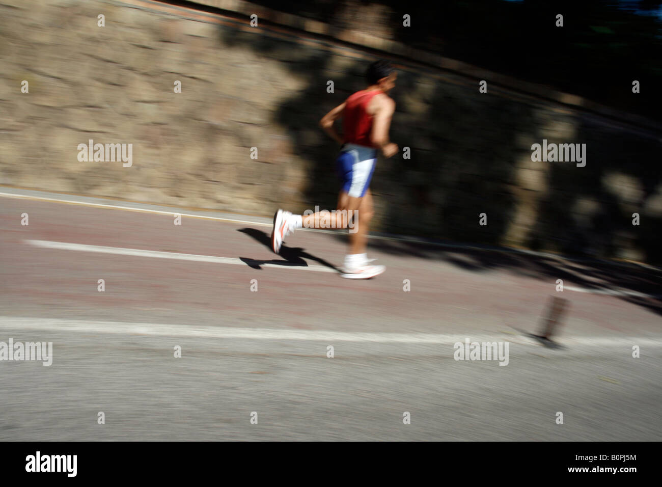 one fast runner in countryside Stock Photo - Alamy