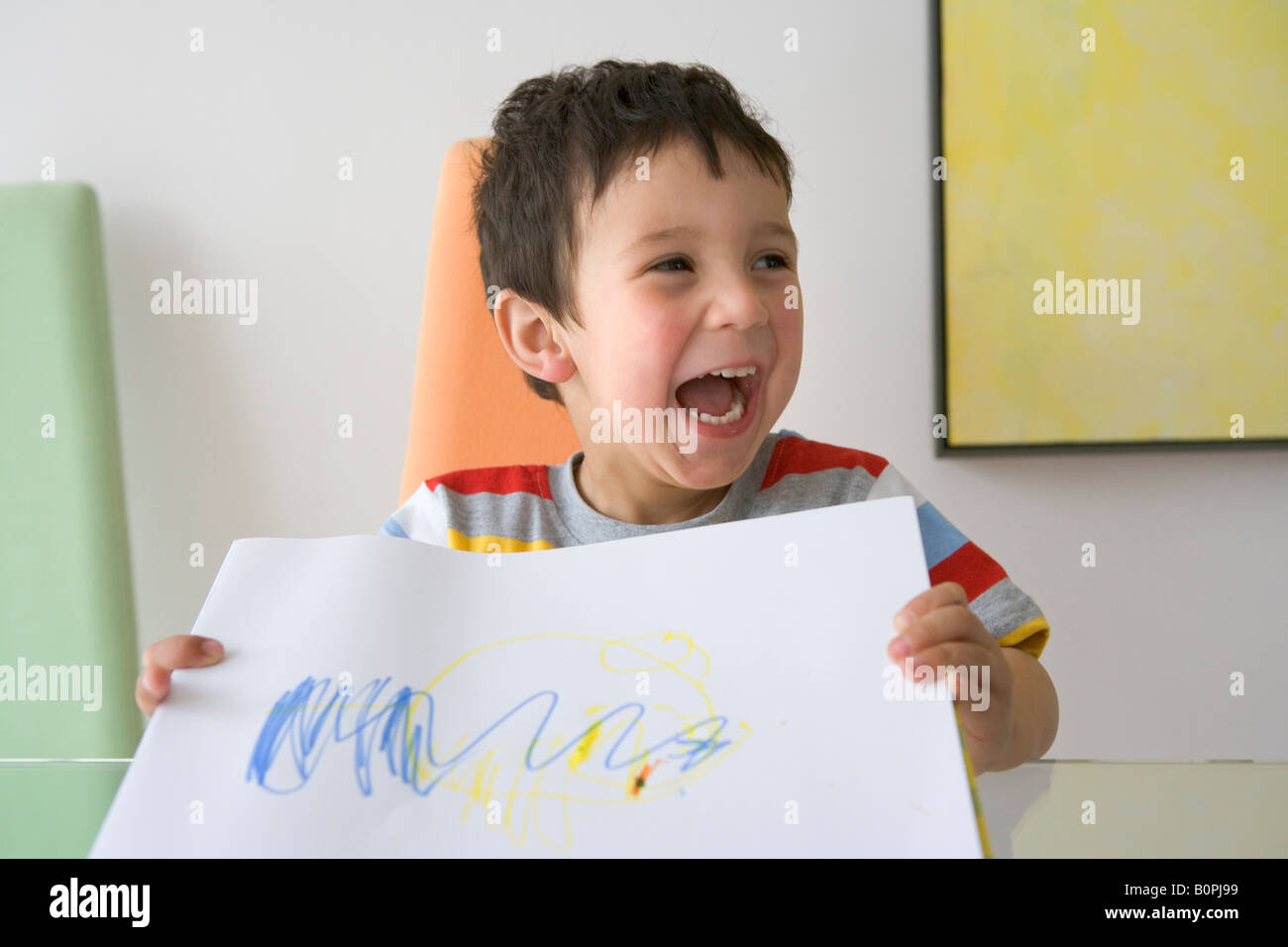 Little boy with a drawing Stock Photo - Alamy