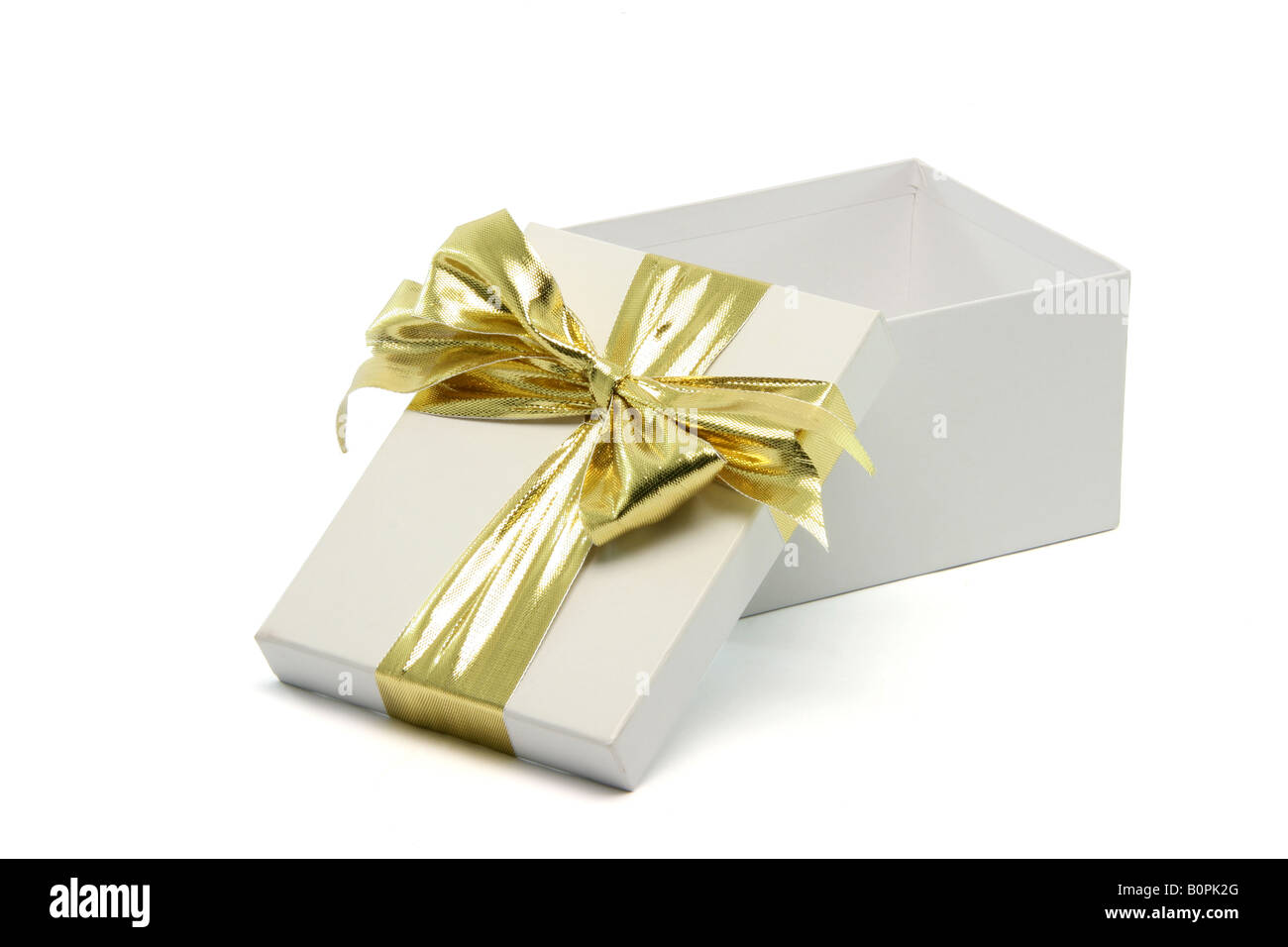 open white gift box with golden ribbon isolated on white background ...