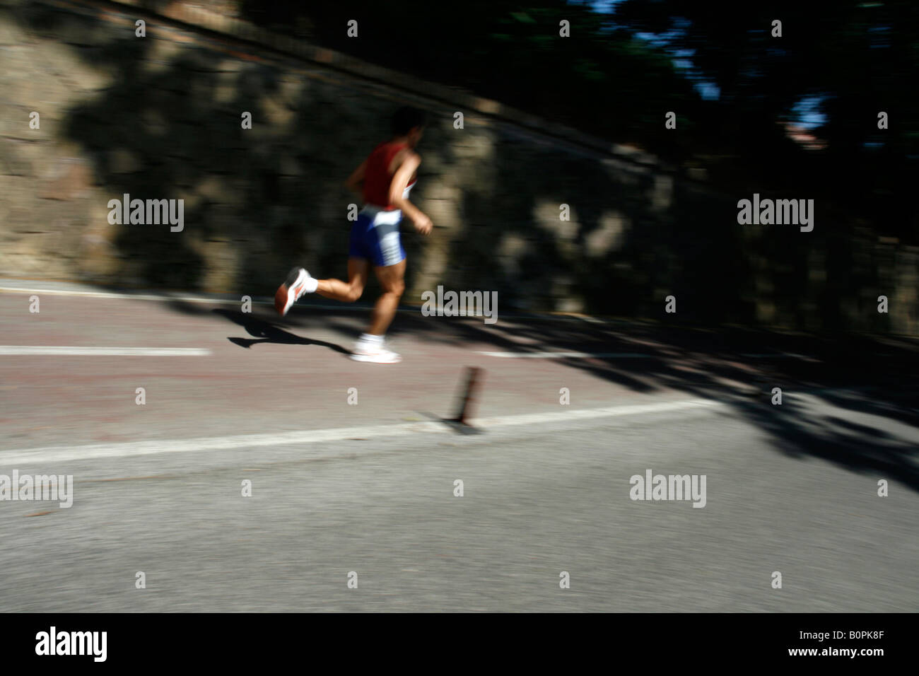 one fast runner in countryside Stock Photo - Alamy