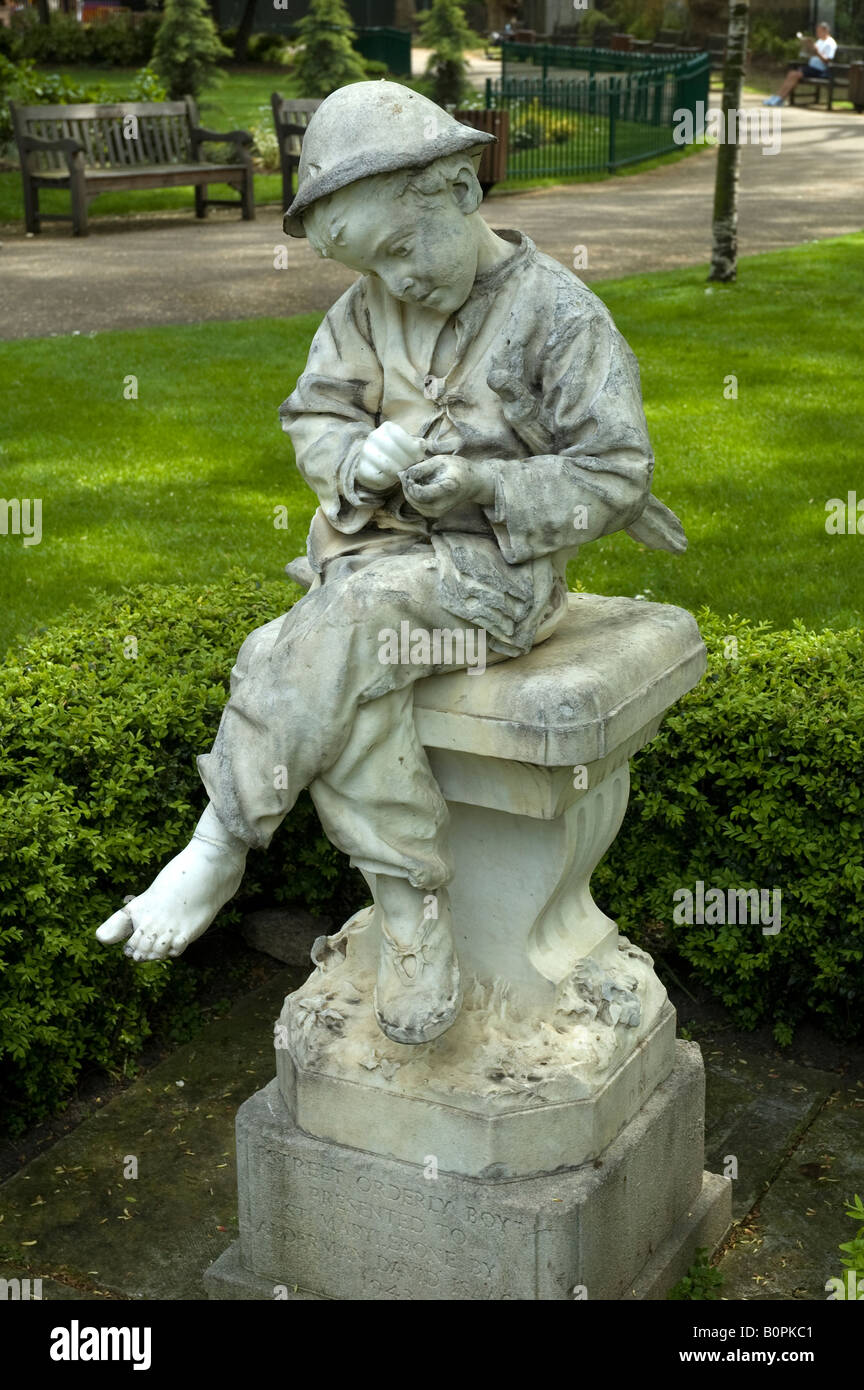 A charming statue of a young boy on Paddington St gardens Marylebone ...