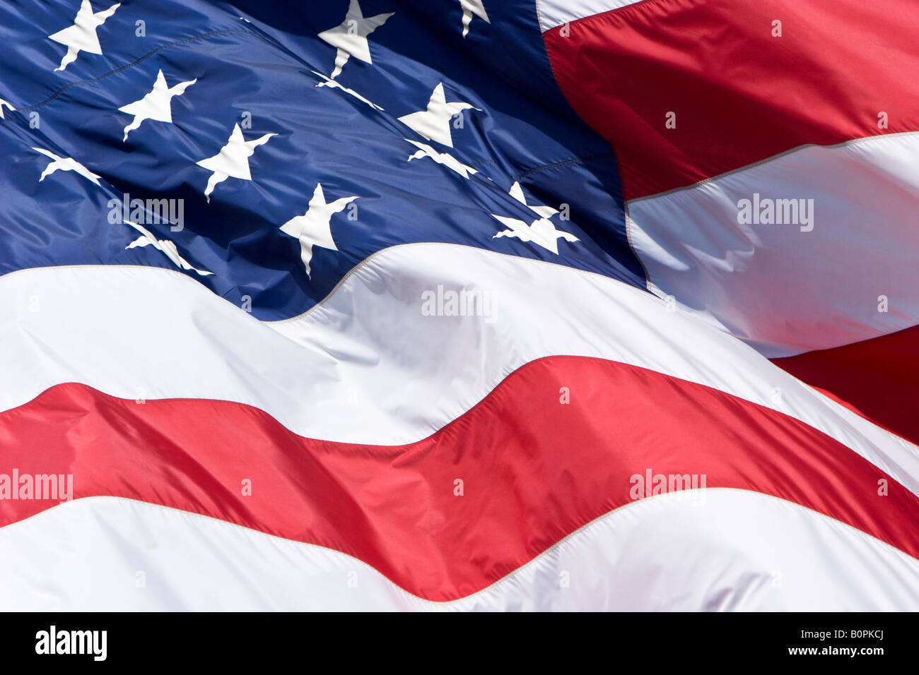 American flag waving in the breeze Stock Photo - Alamy