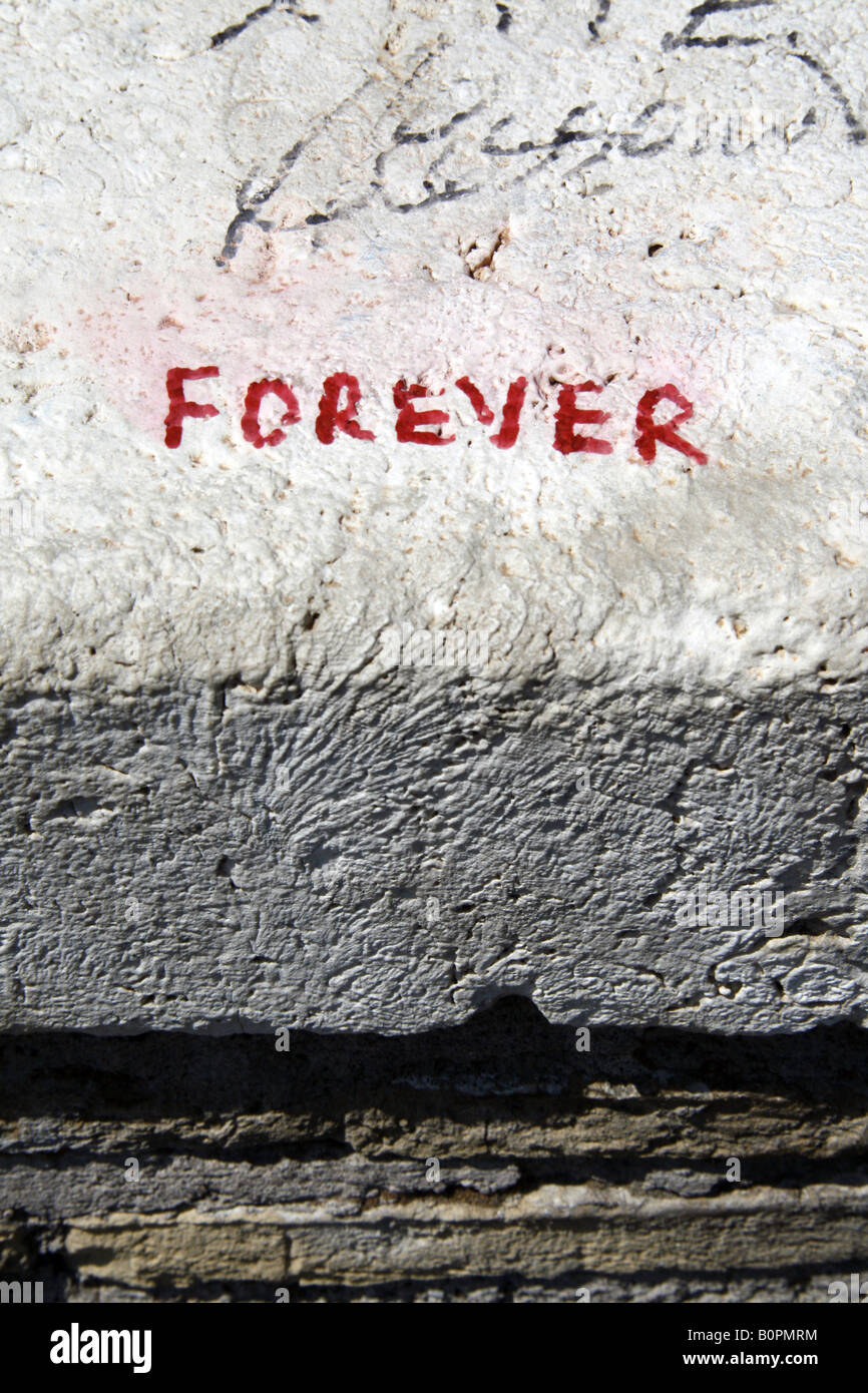 forever word written on wall Stock Photo - Alamy