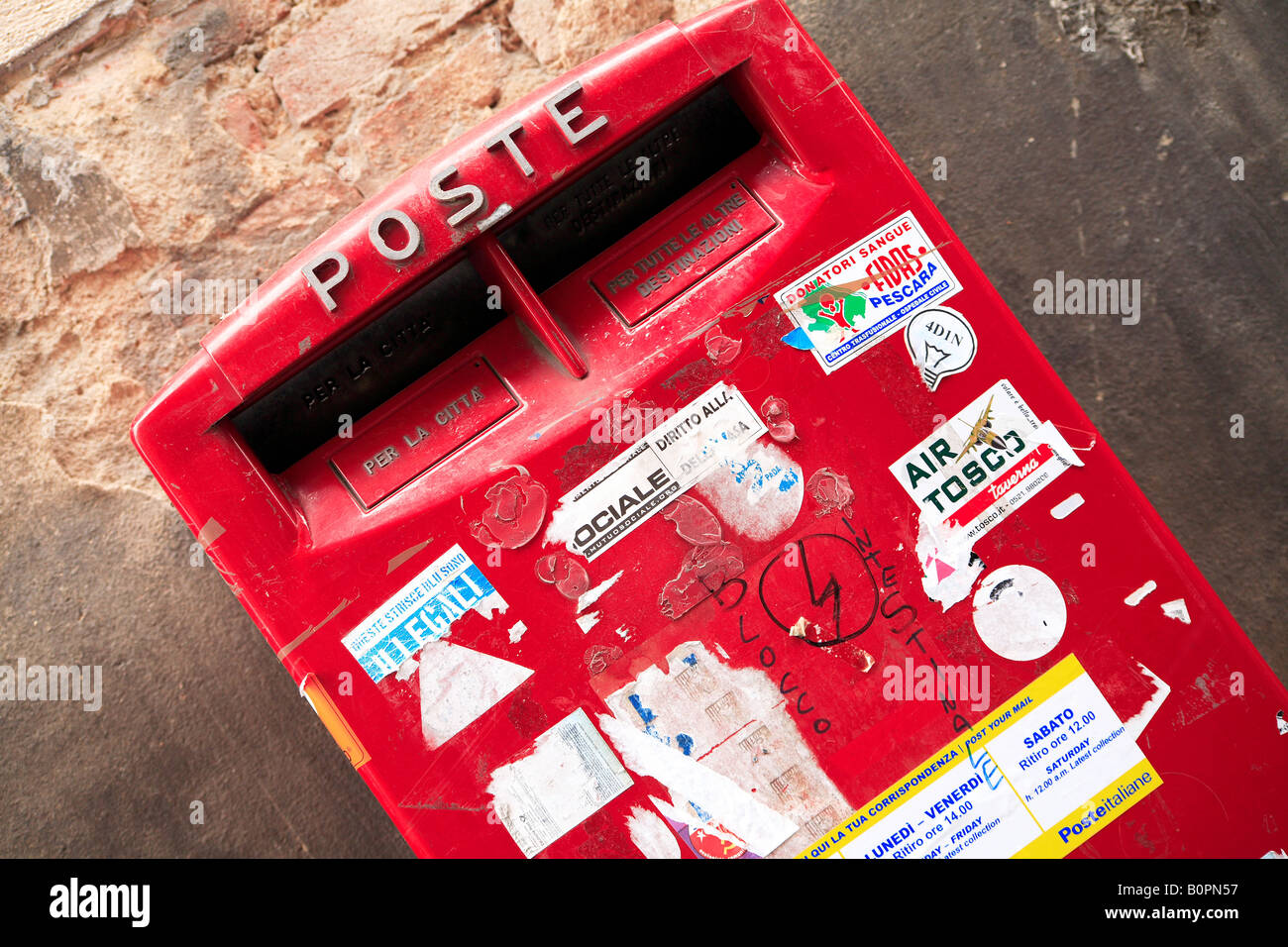 Red letter box in Siena Italy Stock Photo - Alamy
